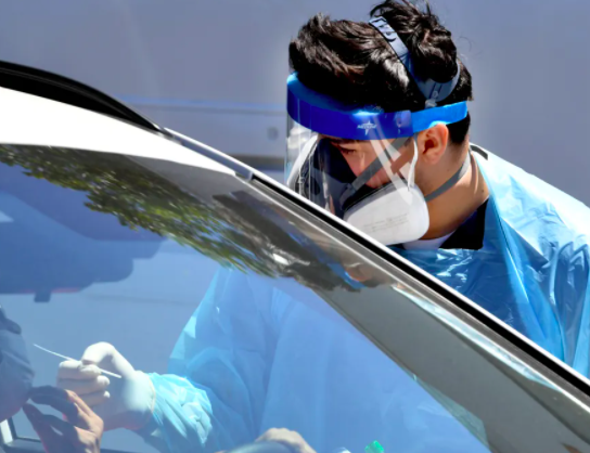 How to get millions of people to take coronavirus tests and stay home ...